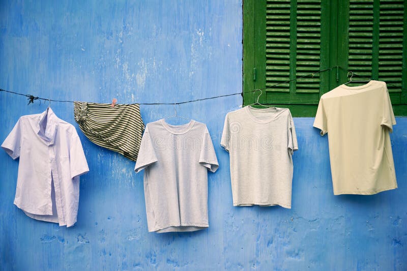 Laundry Hanging on a String Stock Photo - Image of store, blue: 192190428