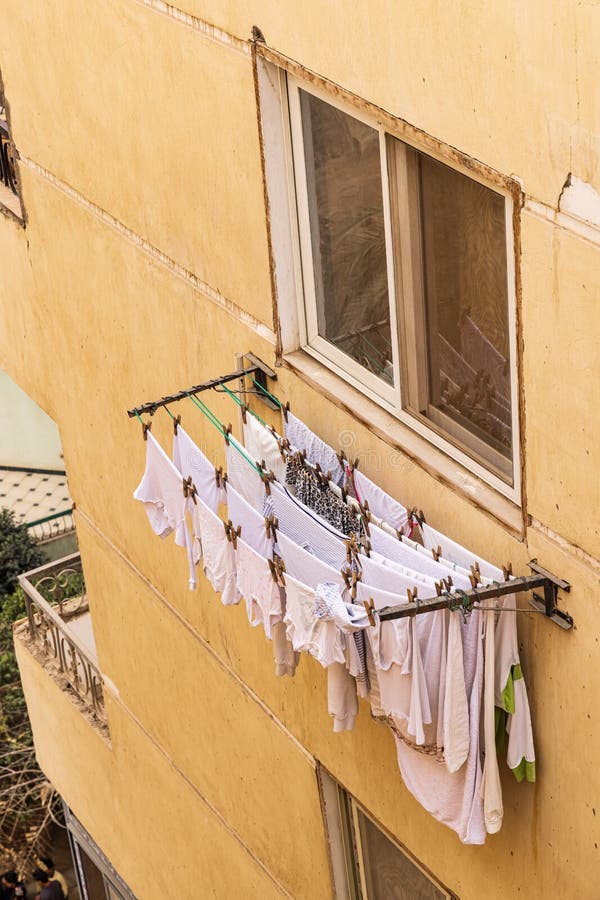 Laundry Hung To Dry Outside a Window in Giza, Egypt Stock Image - Image ...