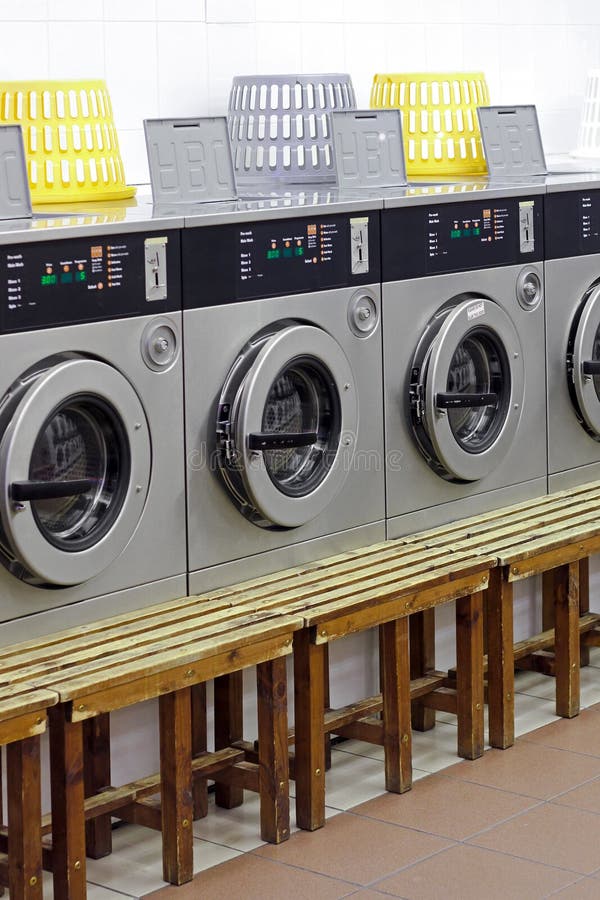 Laundry machines stock photo. Image of commercial, spin - 98295376
