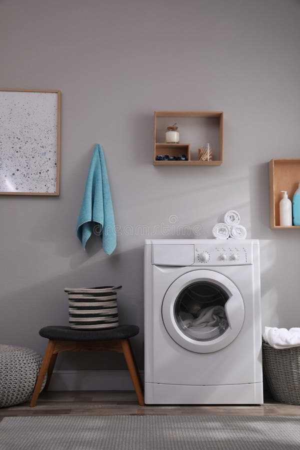 Laundry Room Interior with Modern Washing Machine Near Light Wall Stock ...