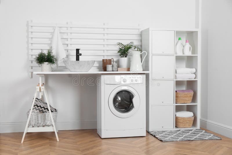 Laundry Room Interior with Modern Washing Machine and Shelving Unit ...