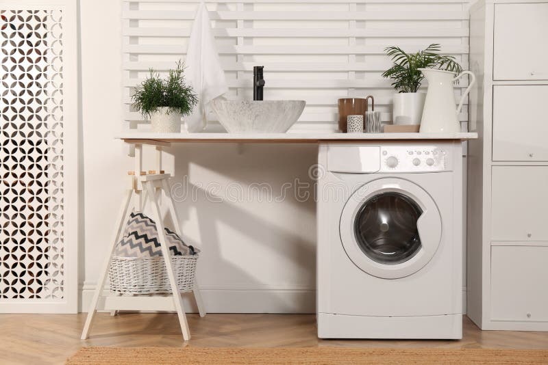 Laundry Room Interior with Modern Washing Machine and Shelving Unit ...