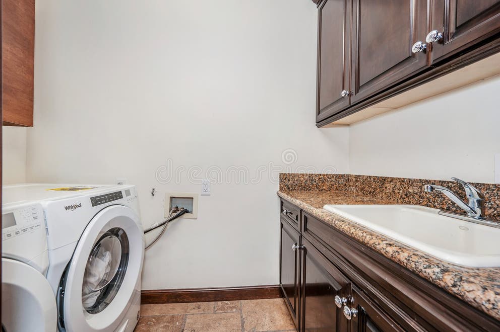 A Washer and Dryer are Sitting in a Room Stock Photo - Image of tidy ...