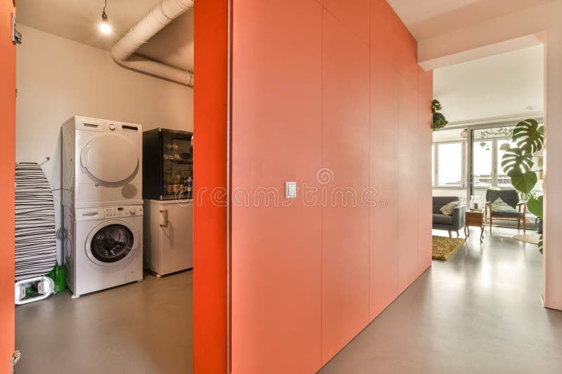 A Kitchen with a Washing Machine and a Dryer Stock Photo - Image of ...