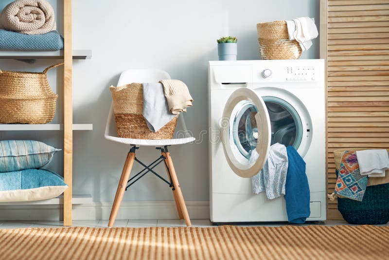 Laundry Room with a Washing Machine Stock Photo - Image of clothing ...