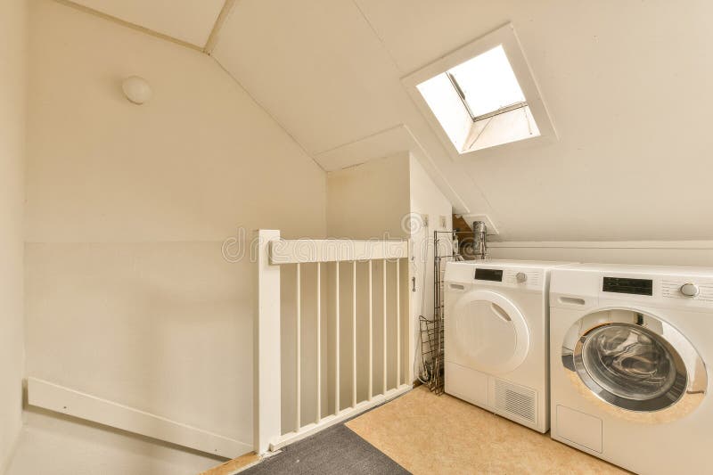 A Laundry Room with a Washing Machine and a Window Stock Photo - Image ...