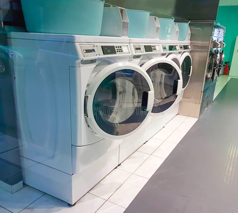 Laundry shop wahs machines stock photo. Image of factory - 206974550