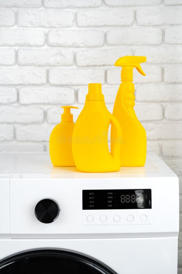 Laundry Washing Detergents Containers on Washing Machine Stock Photo ...