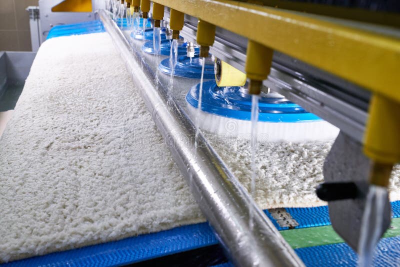 Laundry Worker in the Process of Working on Automatic Machine for ...