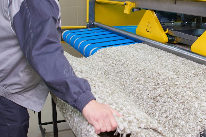 Laundry Worker in the Process of Working on Automatic Machine for ...