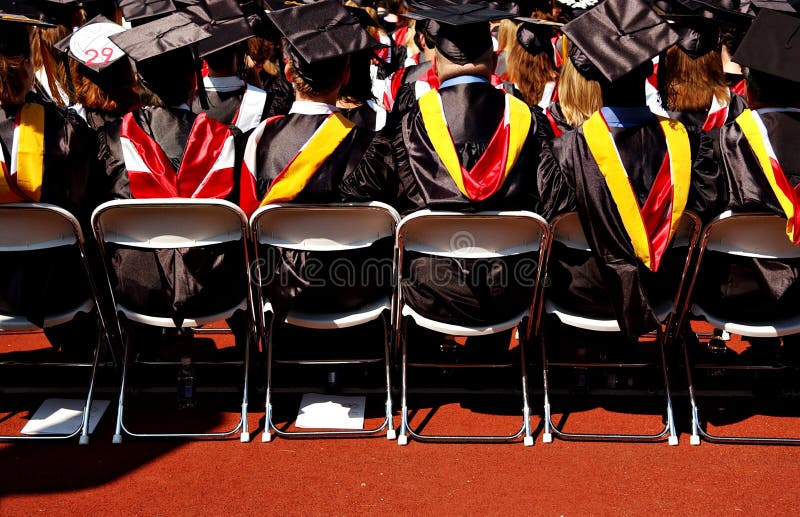 Laureati fotografia stock. Immagine di scuola, protezione - 963146