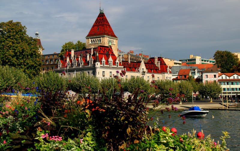 View of Lake Geneva Embankment with Castle Chateau D Ouchy, Boat and ... View of Lake Geneva Embankment with Castle Chateau D Ouchy, Boat and ...