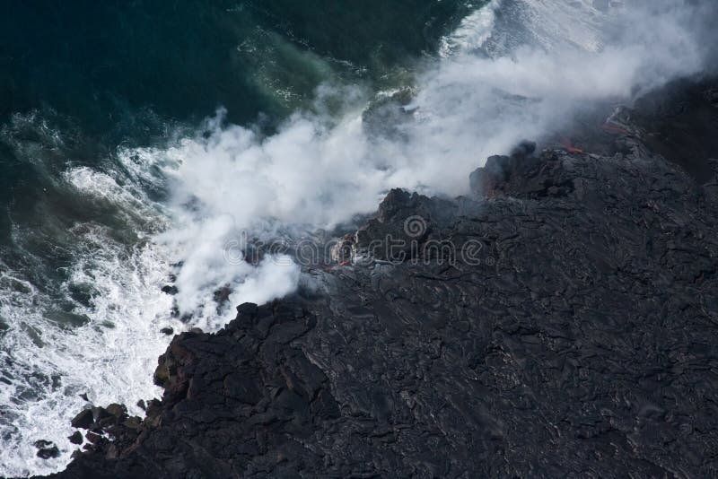 Lava Flowing into Ocean stock image. Image of tourism - 19957873