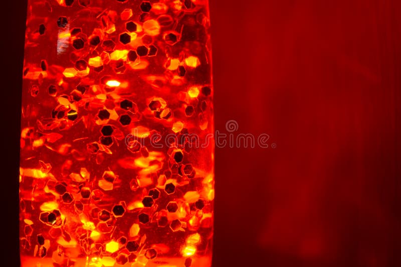 Orange Lava Lamp with Bright Stars at Night on a Red Background Stock ...