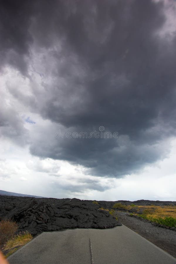 Lava on the Road and a Sign Stock Image - Image of island, volcanic ...