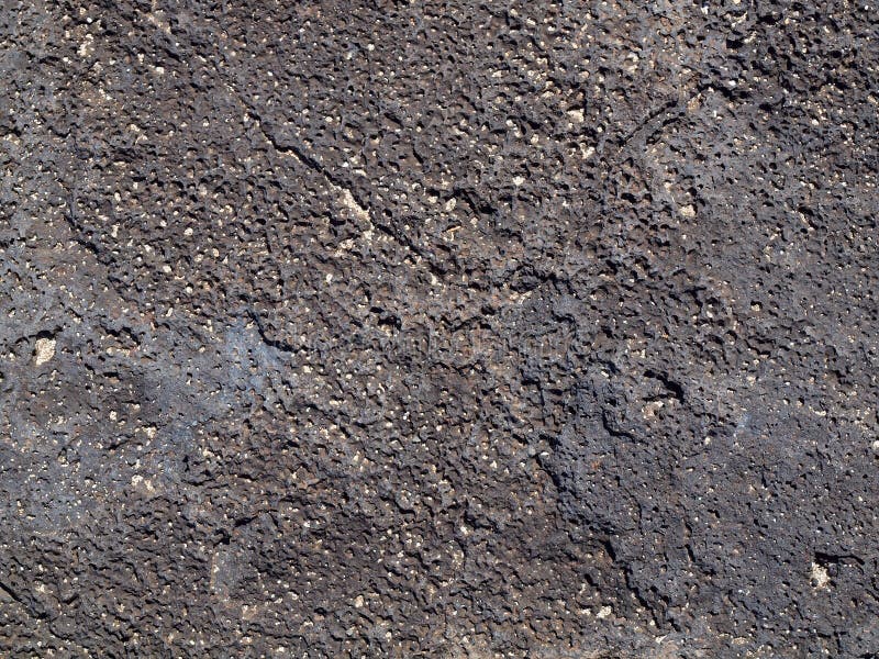 Lava Rock with Bits of Sand on Top Stock Photo - Image of hard, earth ...