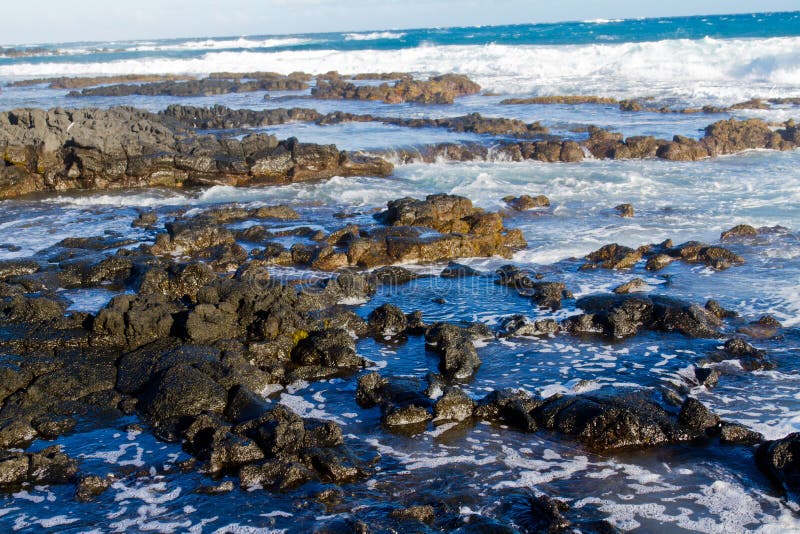 Lava Rocks on the Big Island Stock Photo - Image of colorful, blue ...