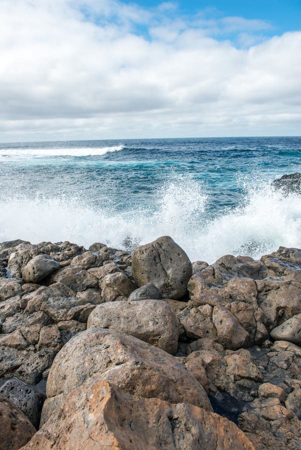Lava rocks breakwater stock photo. Image of canary, ocean - 54640144