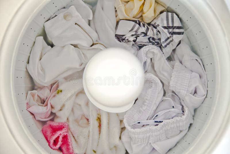 Clothes Washer Being Used To Clean Dirty Clothes and Possibly ...