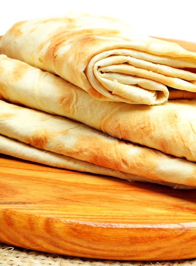 Lavash, Tortilla Wrap Bread on the Cutting Board on White Stock Image ...