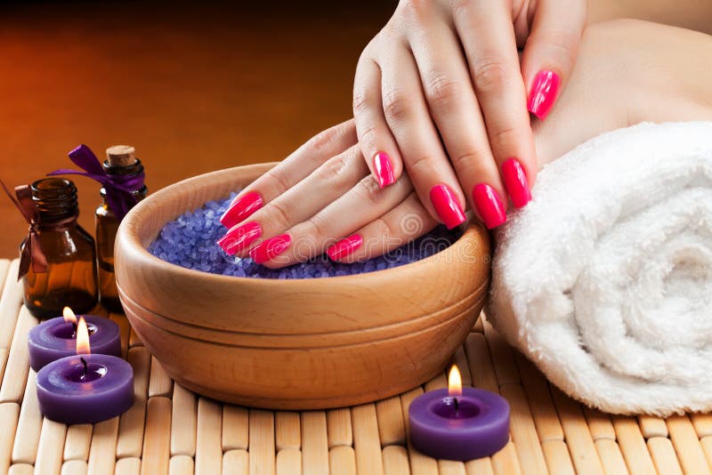 Female Hands with Aromatic Candles and Towel. Spa Stock Image - Image ...