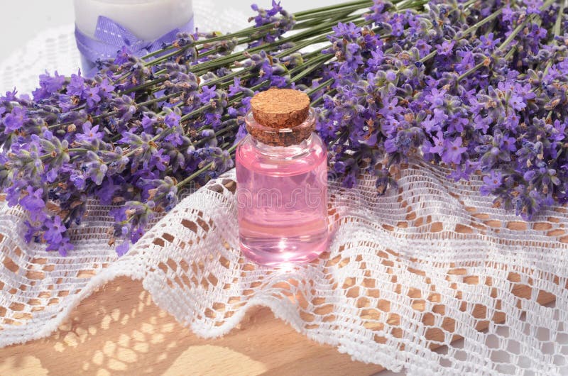 Lavender Water in a Bottle, a Bouquet of Fresh Lavender on a Table with ...