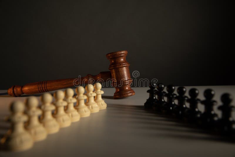 Law gavel and chess pieces stock photo. Image of attorney - 233399778
