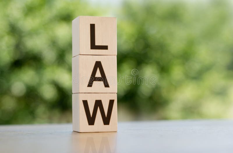 Law Word on Cubes on Green Nature Background Stock Image - Image of ...
