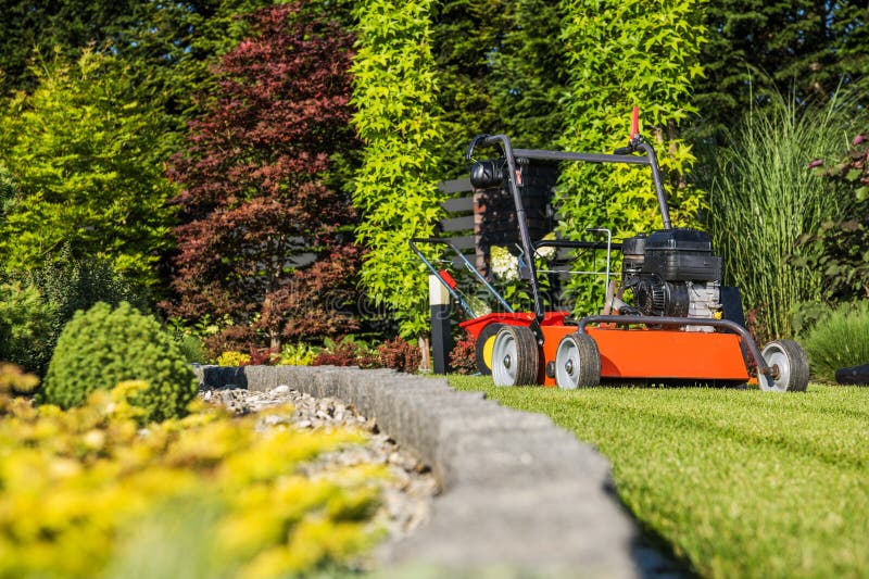 Lawn Aerating Using Gasoline Powered Aerator Machine Stock Photo ...