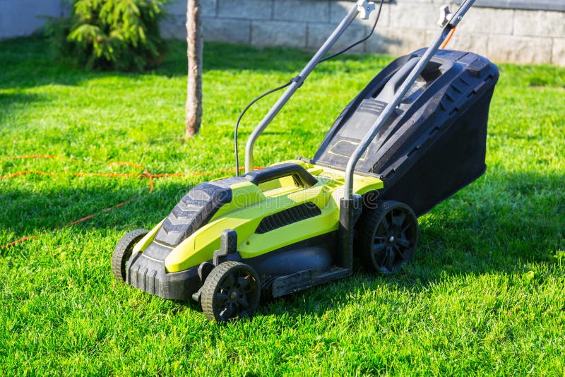 Lawn Mower Cutting Green Grass in Backyard Stock Image - Image of park ...