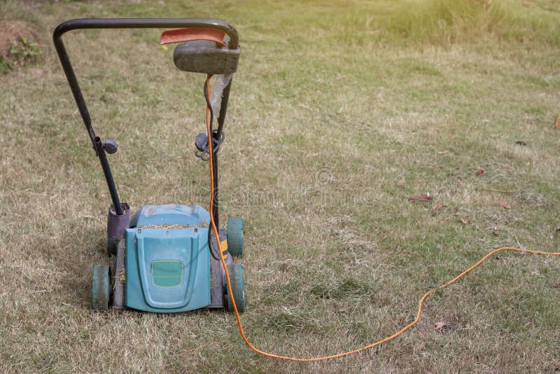 Lawn Mower on Grass with Sunset. Stock Image - Image of lawnmower ...