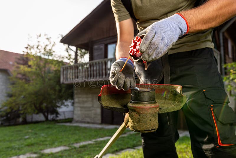 Lawn Mower Pulls the Line Out of the Trimmer Coil. Maintenance of ...