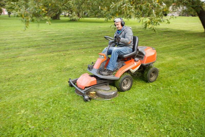 Lawn mower tractor stock photo. Image of mowing, grass - 128285014