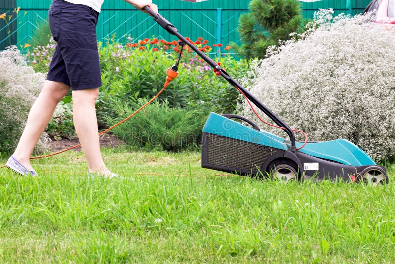 Lawn Mower at Work stock image. Image of hobby, cutter - 95752813