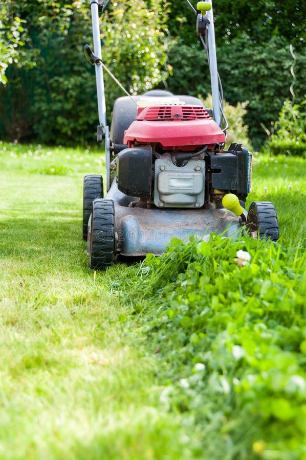 Lawn mowing stock photo. Image of spring, mower, lawnmower - 45333568
