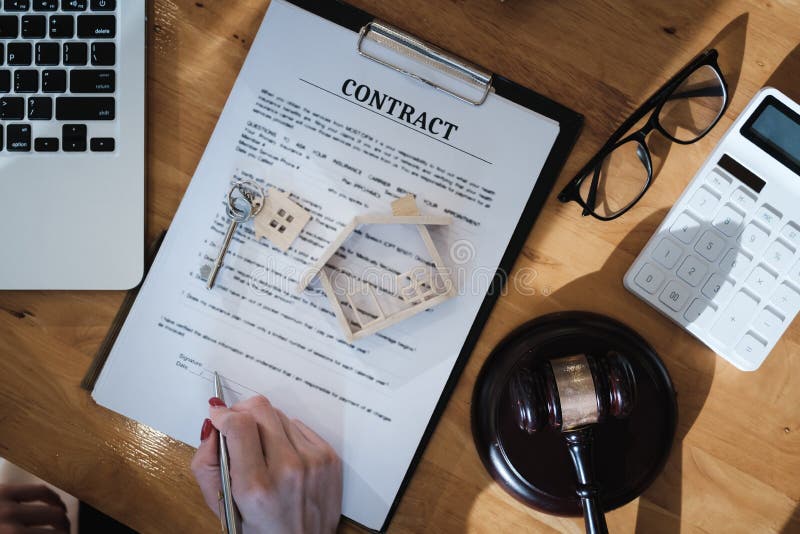 Lawyer Checking Agreement Document before Sending To Client Stock Photo ...