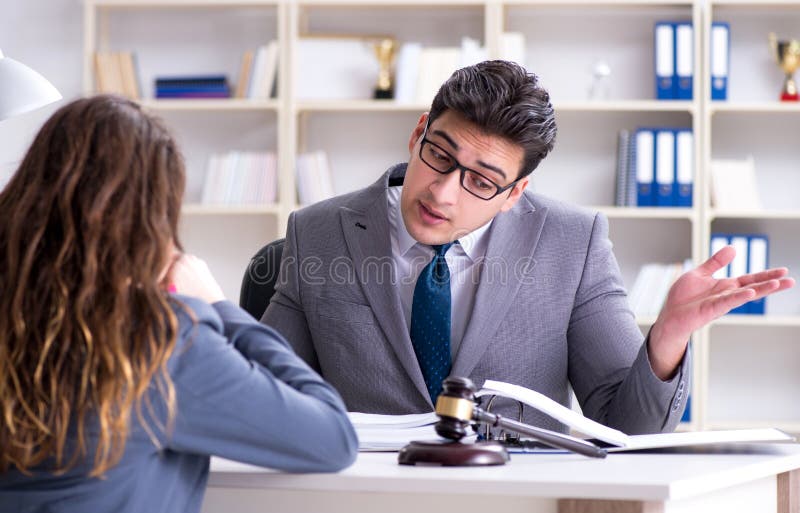 Lawyer Discussing Legal Case with Client Stock Photo - Image of ...