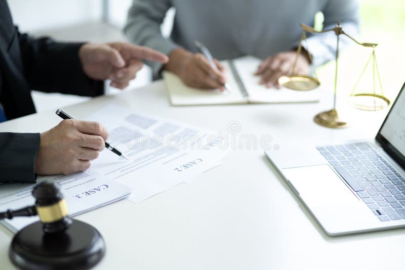 Lawyer is Giving Advice and Introduce a Pending Case To an Assistant ...