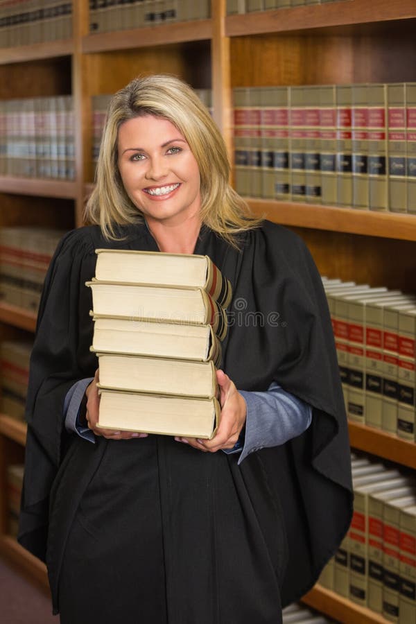 Lawyer Holding Books in the Law Library Stock Image - Image of academic ...