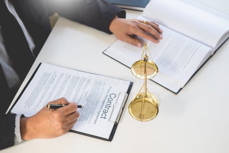 Lawyer Judge Reading Writes the Document in Court at His Desk Stock ...