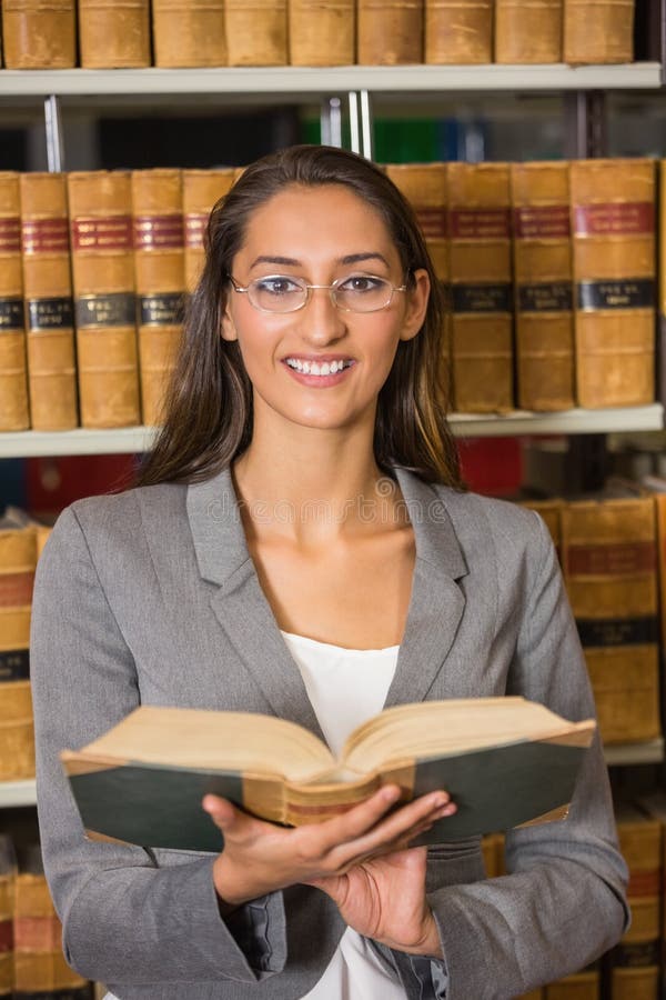 Lawyer Reading Book in the Law Library Stock Photo - Image of mixedrace ...