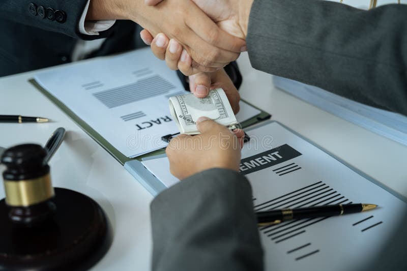 Lawyer Shaking Hands with Client after Discussing Final Contract ...