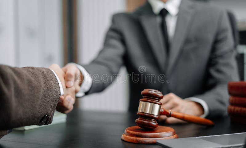 Lawyer Shaking Hands with Client after Discussing Final Contract ...