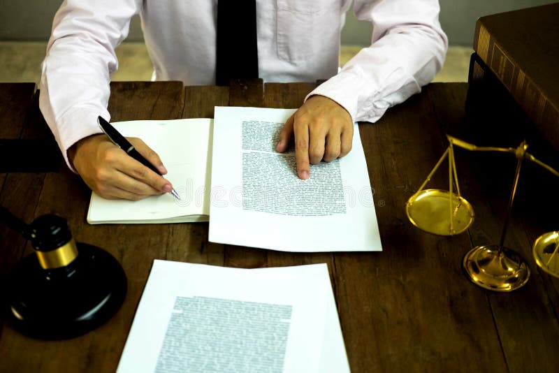 Lawyer Working with Contract Papers on the Table in Office. Cons Stock ...