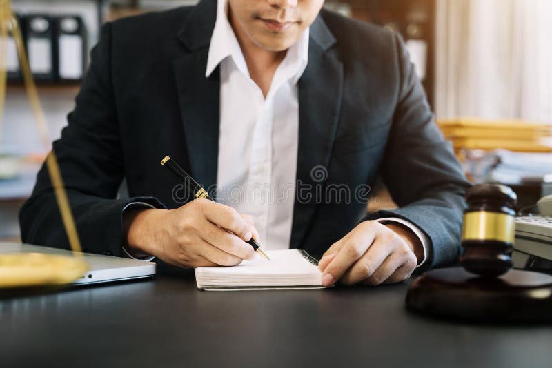 Lawyers Practice Taking Notes and Working on Computers in the Office in ...