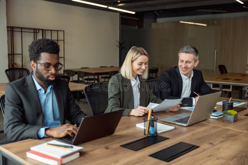 Lawyers Working Together on the Project and Looking Interested and ...