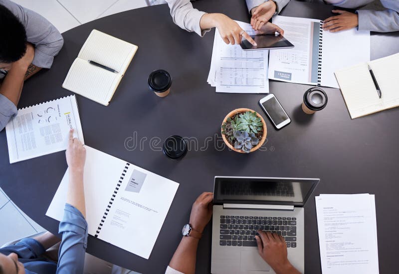 Lay it All on the Table. an Office Table with Staff Using a Digital ...