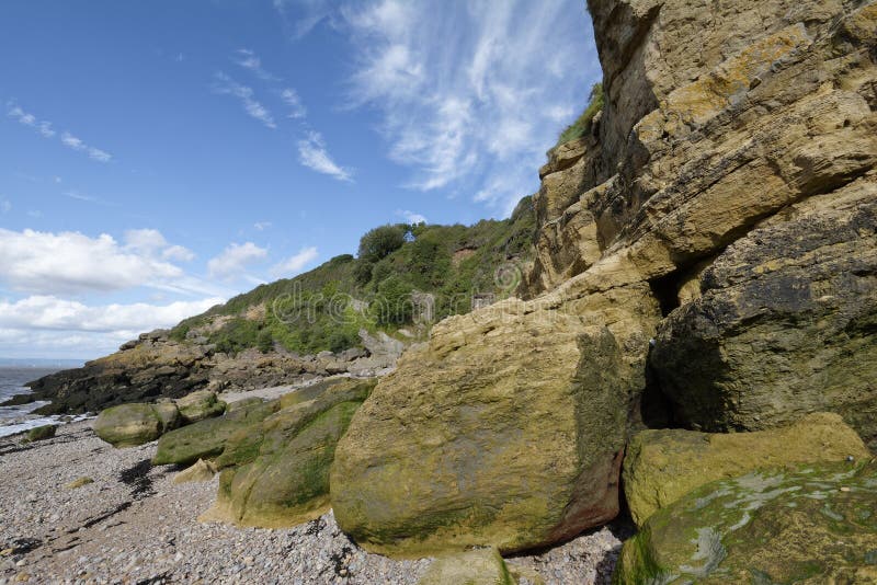 Layde Bay stock photo. Image of britain, tide, shingle - 235544972