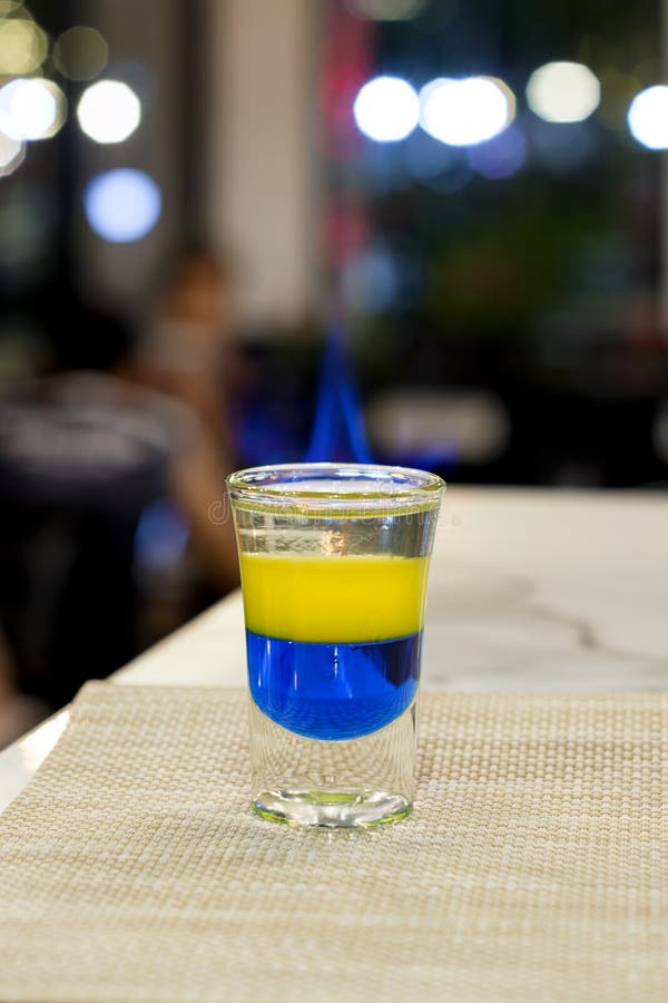 Layer Cocktail with Blaze for Nightlife Stock Image - Image of cocktail ...