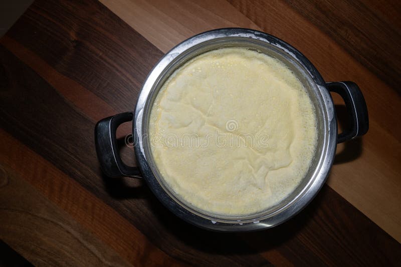 A Layer of Cream Formed on Milk Boiled in a Saucepan Stock Image ...